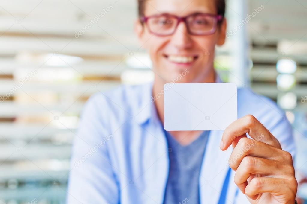 Man holding blank name card. — Stock Photo © apid #128056212