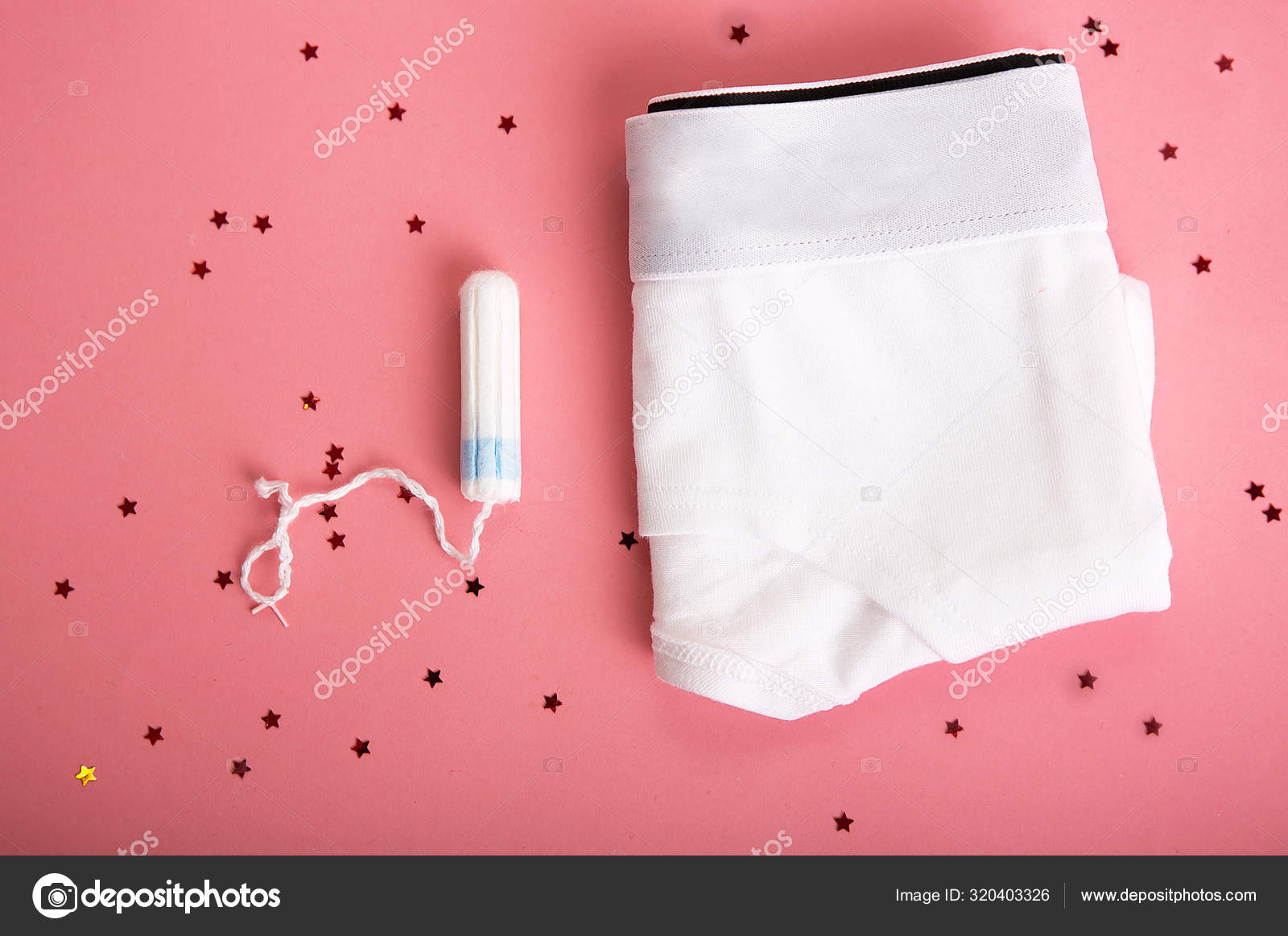 Tampon on a pink background. — Stock Photo © Kokulina #320403326