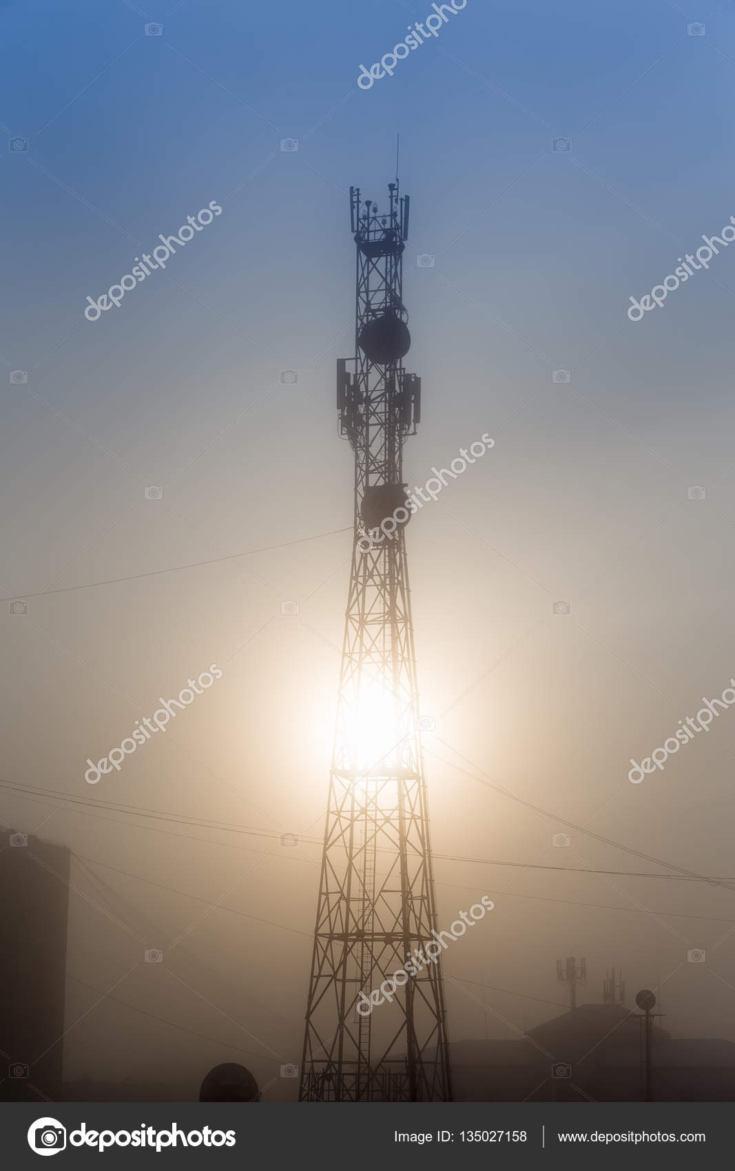 Telecommunications tower in the frosty fog — Stock Photo © ASB63 #135027158