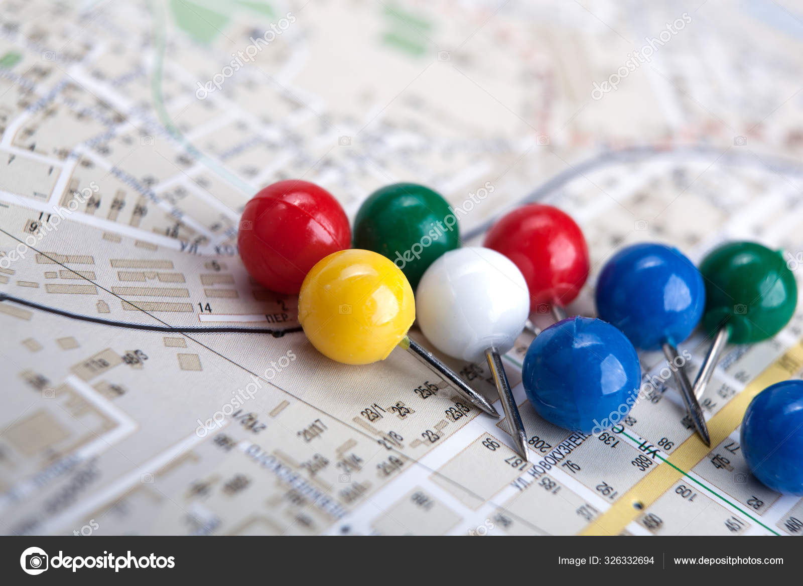 Topographic map with colored needles pushpins close up Stock Photo by ...