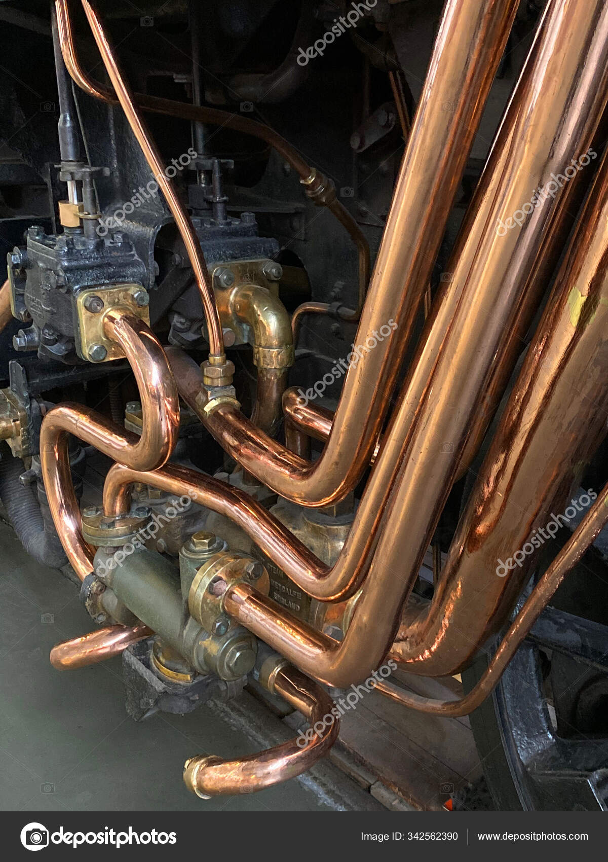Copper pipework on a vintage steam locomotive — Stock Editorial Photo ...