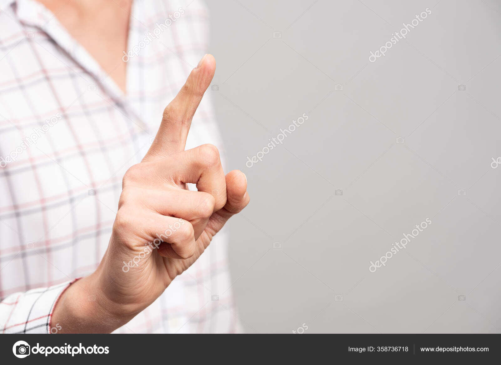 Female Hand Shows Index Finger Neutral Background Stock Photo by ...