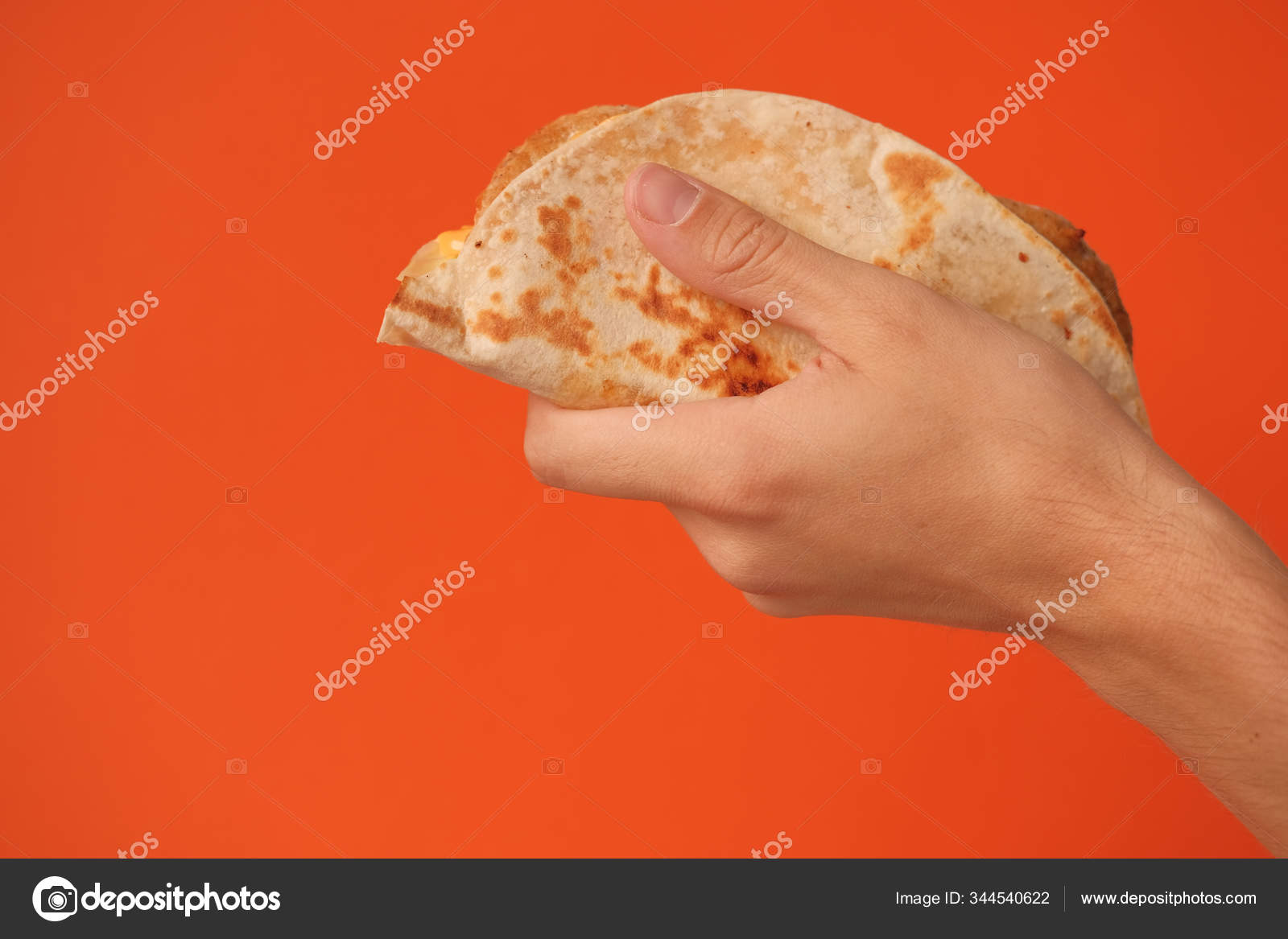 Hand Holding Taco Close View — Stock Photo © olegsamoylov #344540622