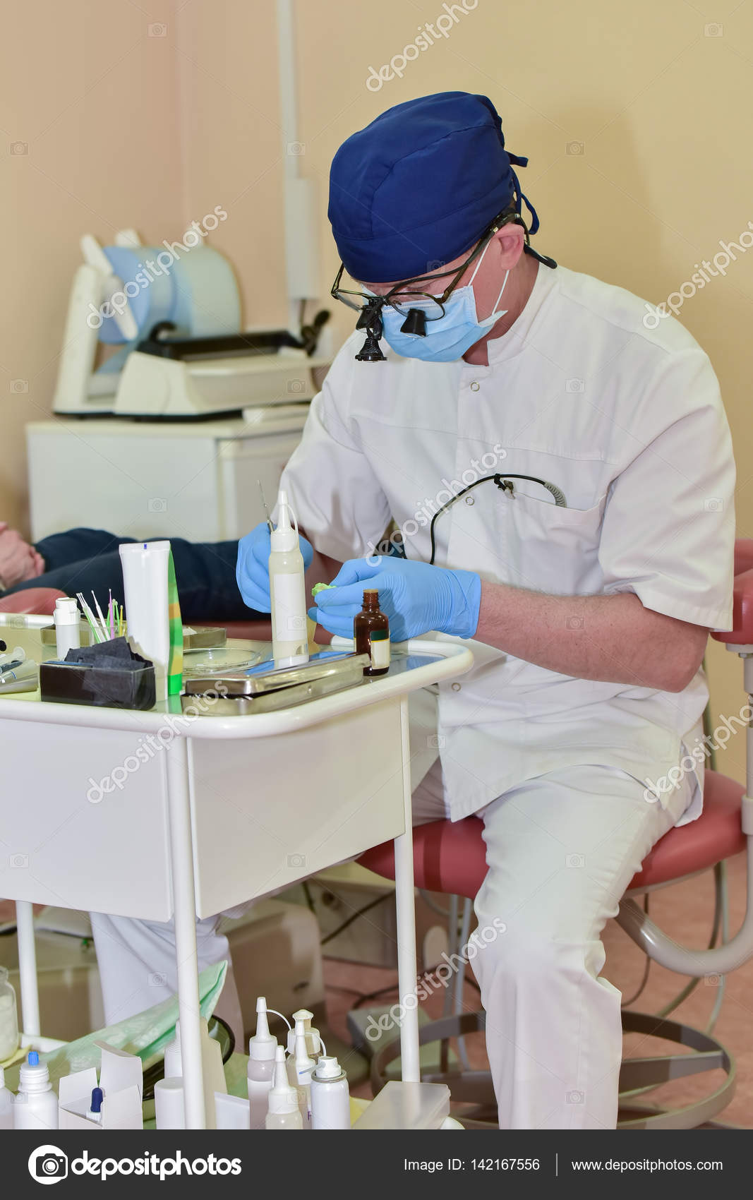 Prosthodontist-dentist at work — Stock Photo © NJR-Depositbuyer #142167556