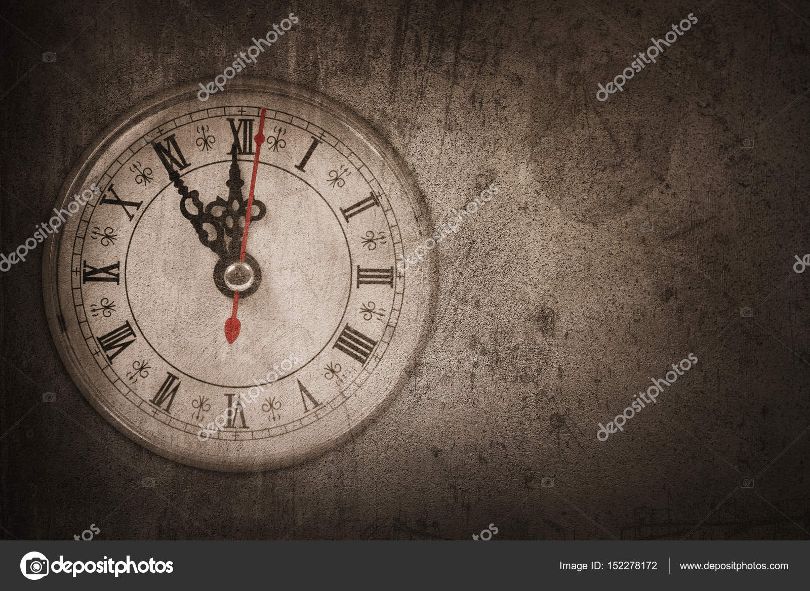 Wall clock hanging on the left side in a brown wall Stock Photo by ...