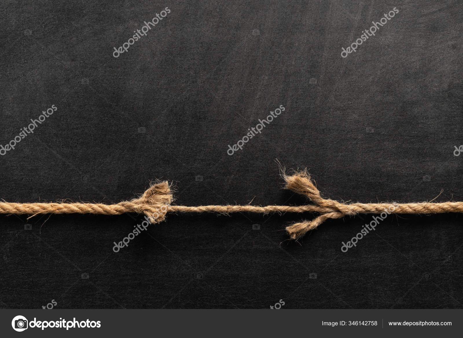Long, old frayed rope is breaking off. Isolated on black. — Stock Photo ...