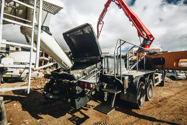The process of pouring concrete in the car - Stock Image - Everypixel