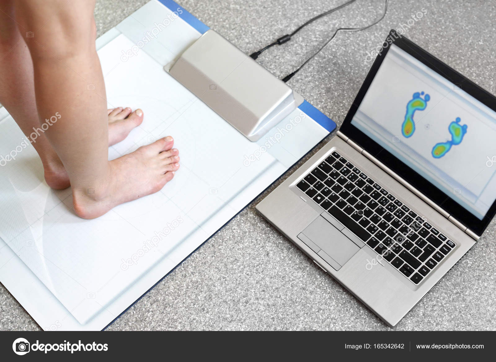 Orthopedics, foot podoscope test. Stock Photo by ©robertprzybysz 165342642