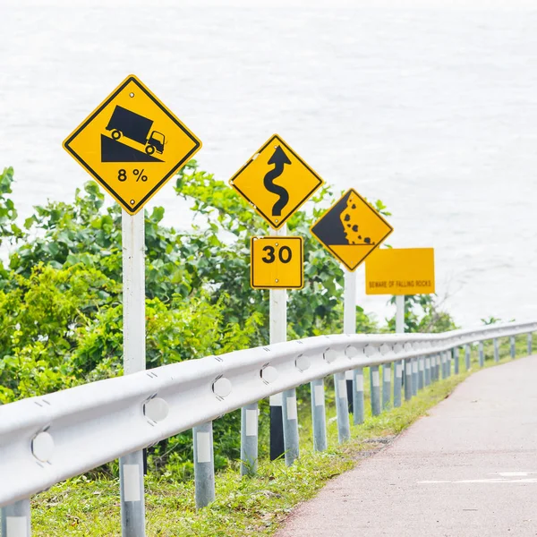 Dangerous curves sign Stock Photos, Royalty Free Dangerous curves sign ...