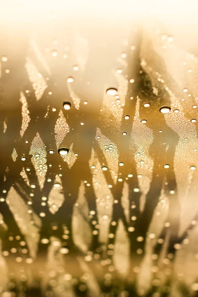 Drops of the water on a misted glass of a car. Water drops background ...
