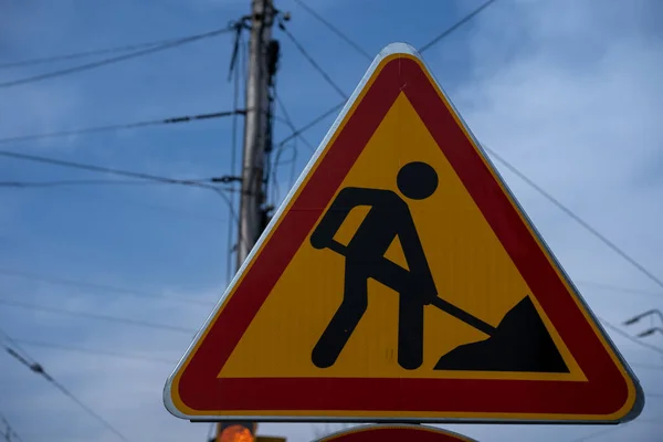 Traffic warning sign about road repair ahead - Stock Image - Everypixel