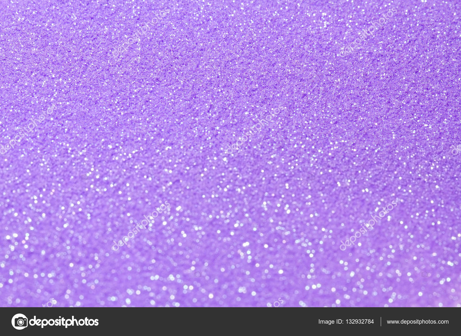 Abstract violet glitter background with shining light and soft bokeh ...