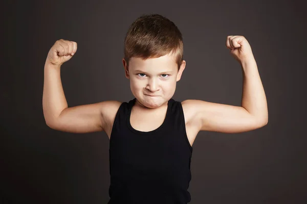 Child. Funny Little Boy.Sport Handsome Boy.bodybuilder showing his hand ...