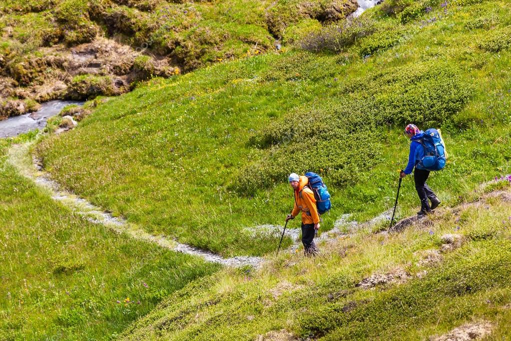 Young people are hiking in highlands of Altai mountains, Russia Stock ...