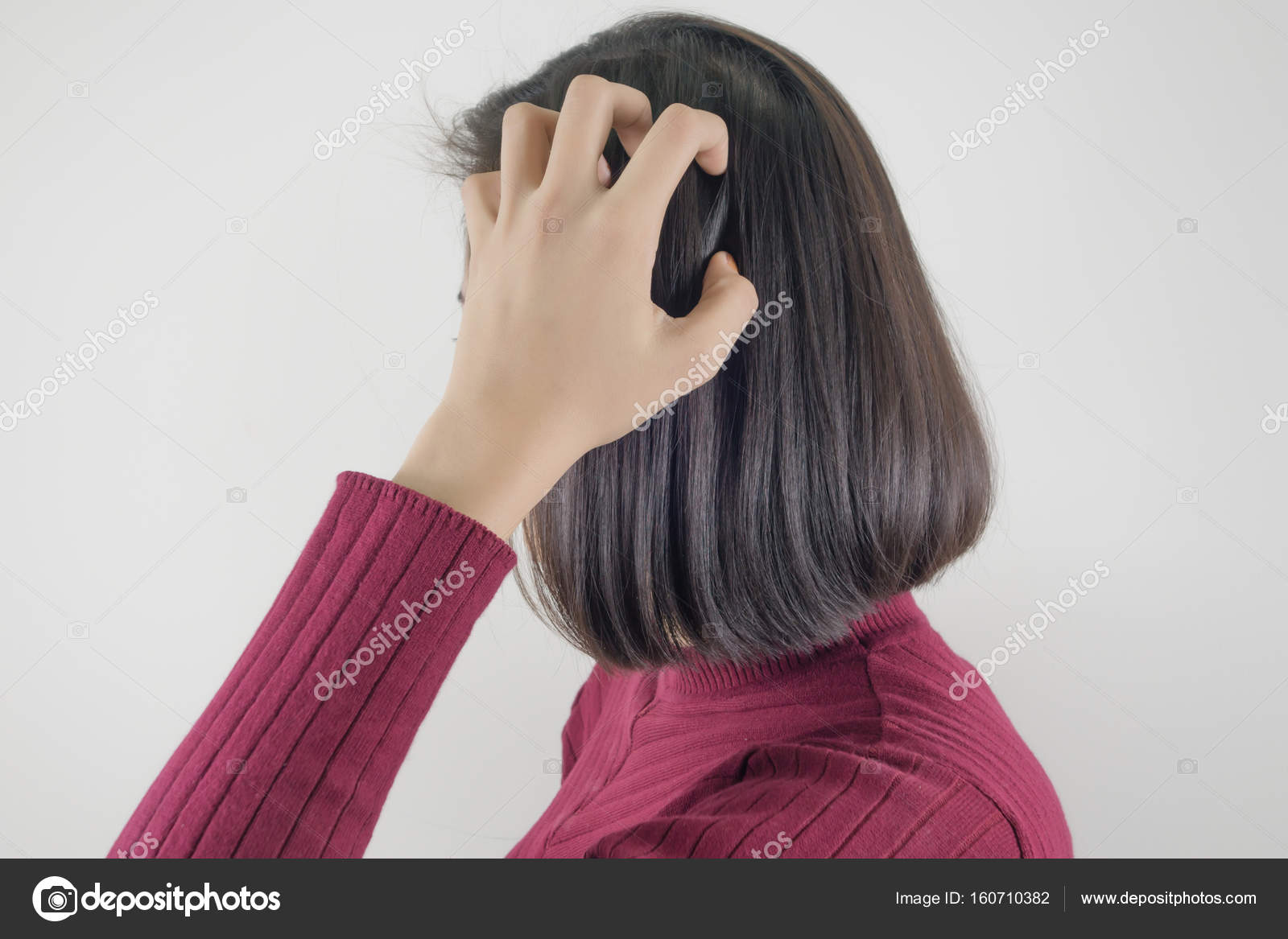 Woman scratching her head Stock Photo by ©panupong1982 160710382