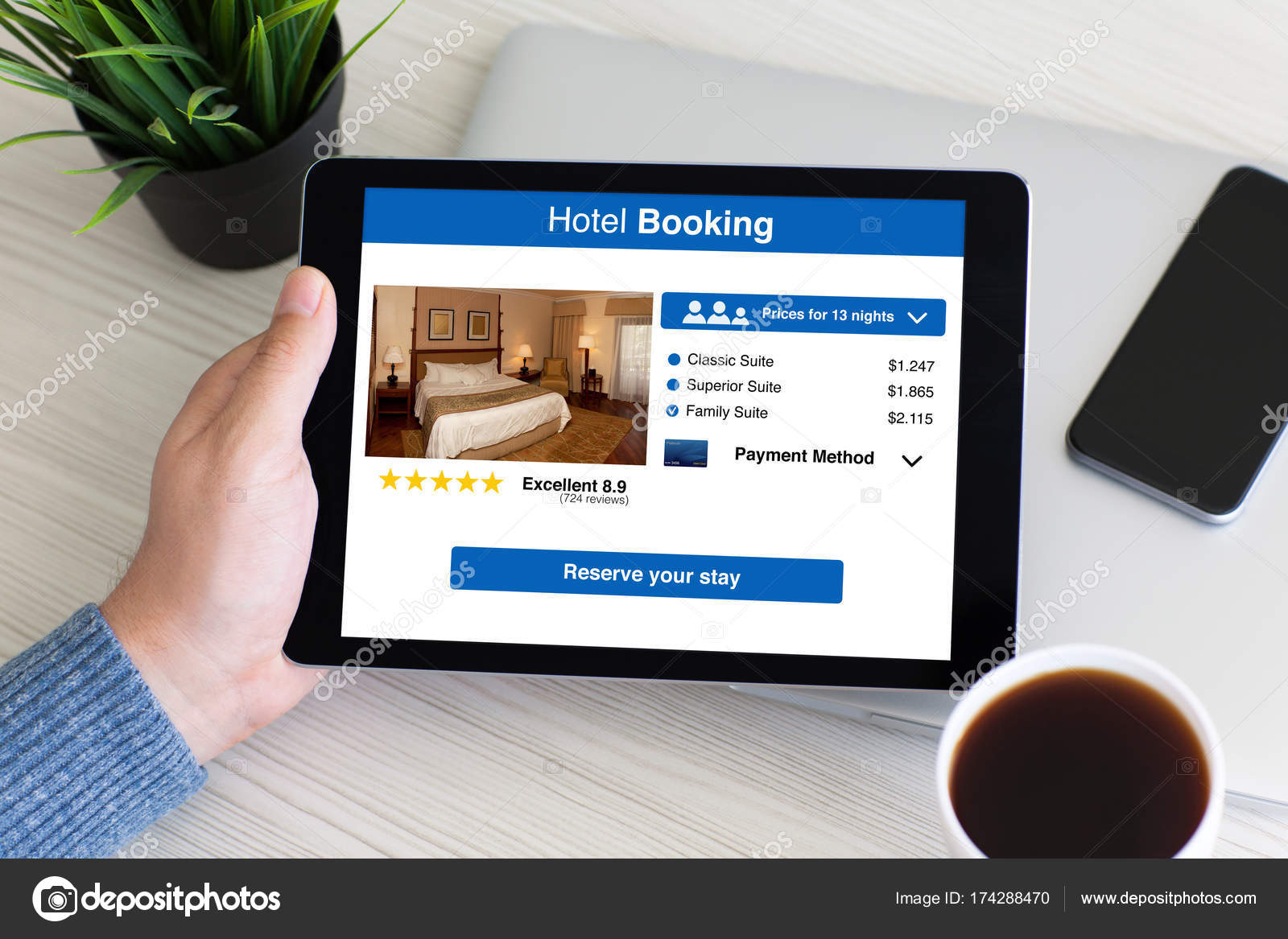 Man hand holding computer tablet with app hotel booking screen — Stock ...