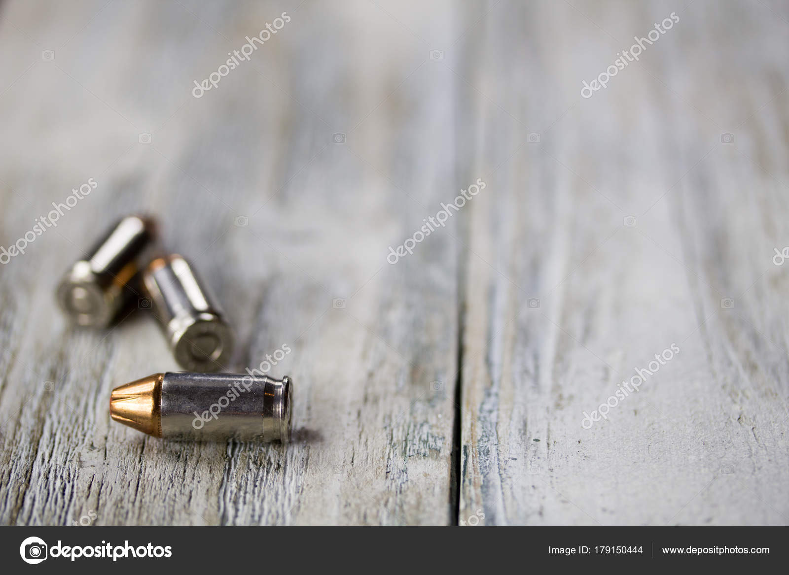 Full Metal Jacket Bullets on Background — Stock Photo © enterlinedesign ...