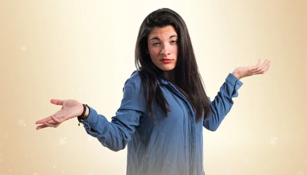 Teen girl making unimportant gesture Stock Photo by ©luismolinero 128591562