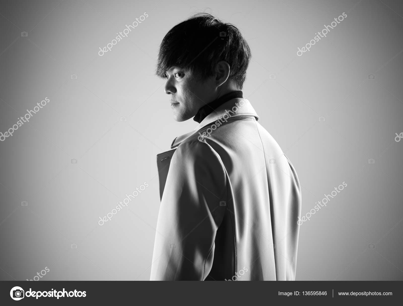 Chinese handsome model man in studio — Stock Photo © luismolinero ...