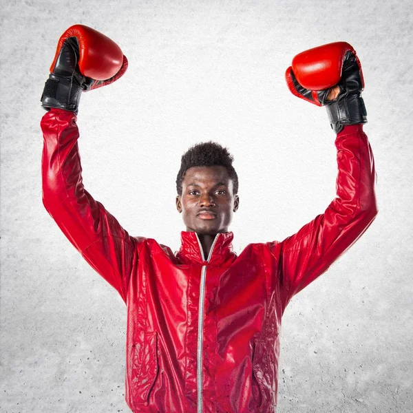 Black man with boxing gloves - Stock Image - Everypixel