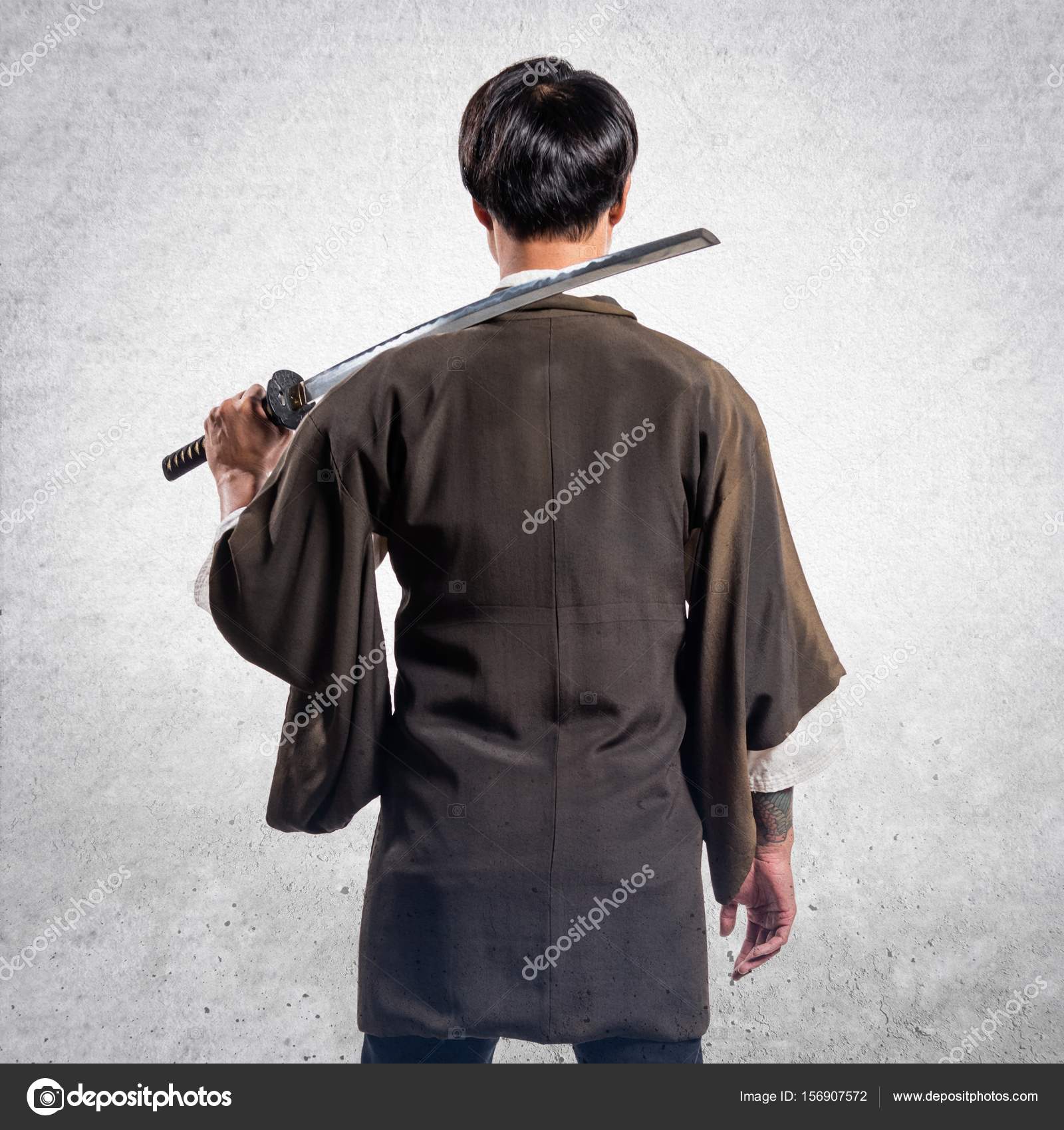Asian samurai man with katana on textured background Stock Photo by ...