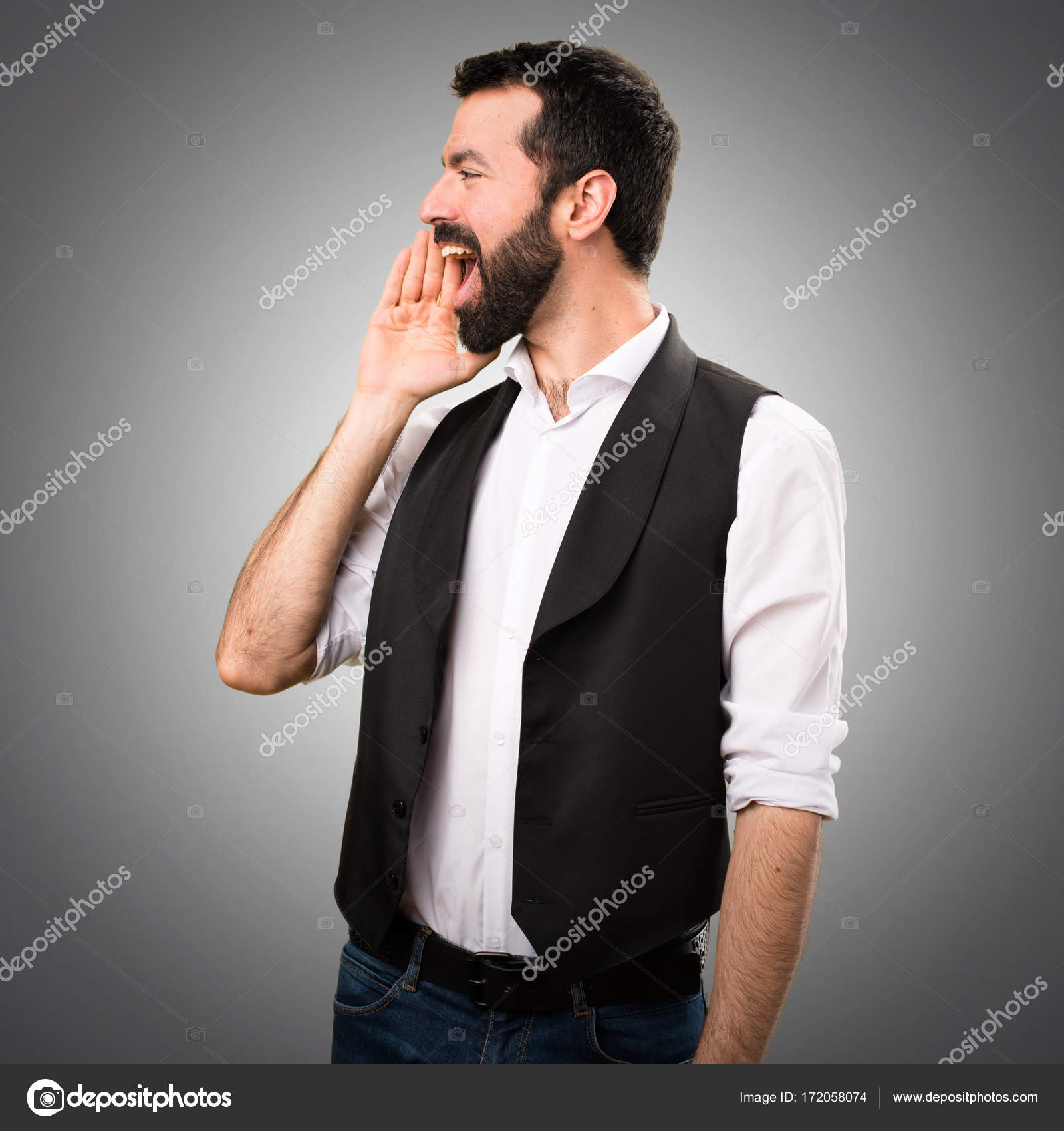 Cool man shouting on grey background — Stock Photo © luismolinero ...