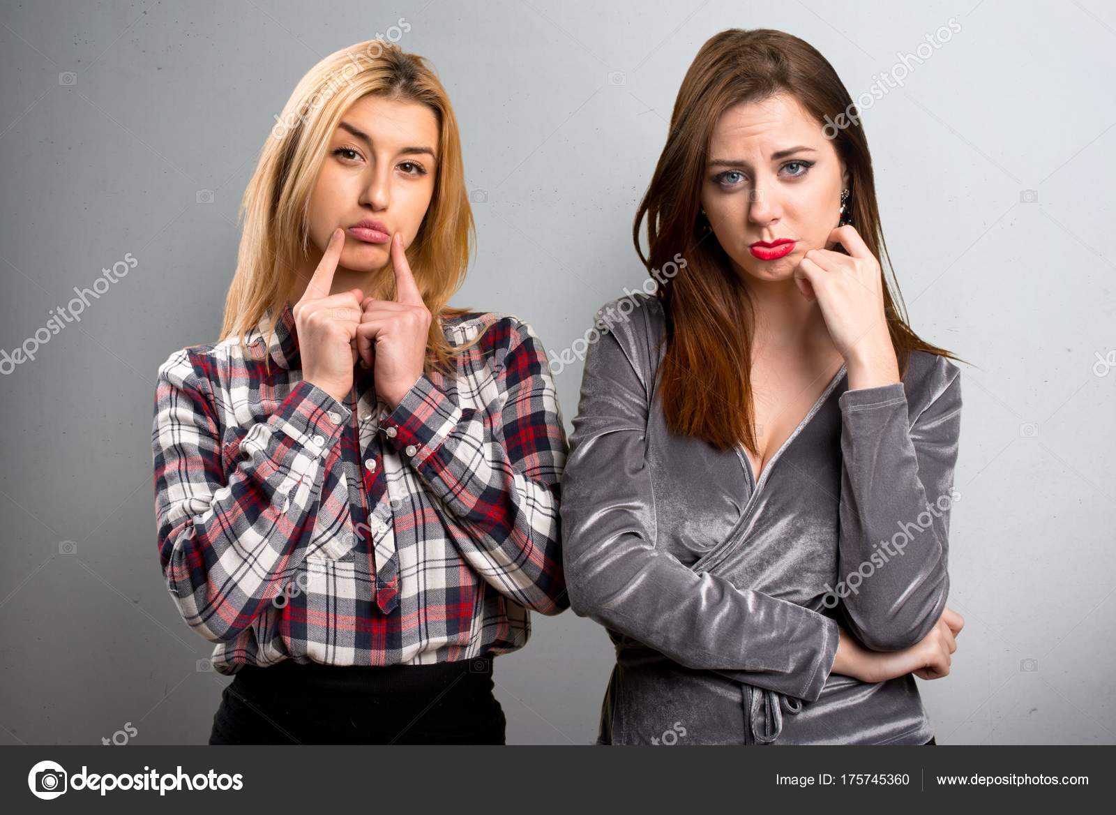 Two friends sad on textured background Stock Photo by ©luismolinero ...
