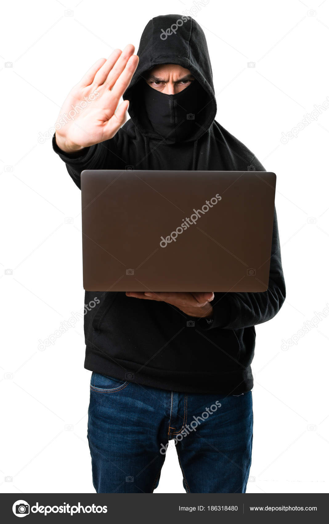Hacker with his computer making stop sign on isolated white back Stock ...