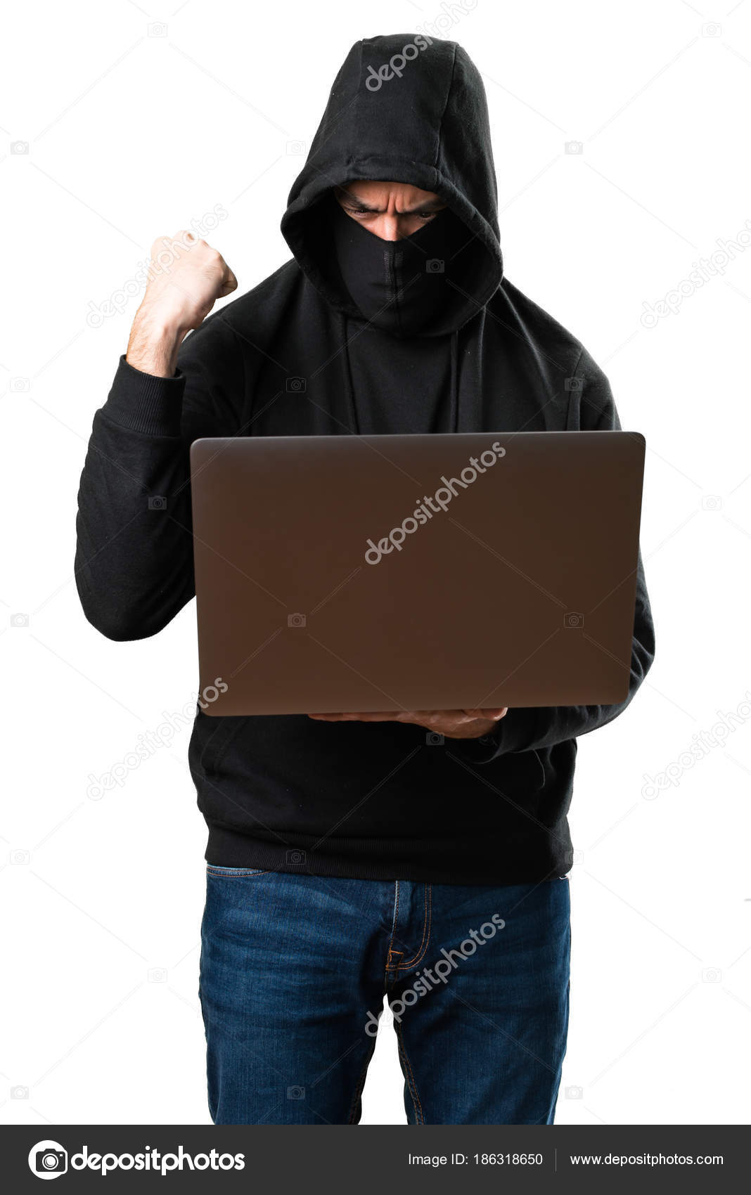 Lucky hacker with his computer on isolated white background Stock Photo ...