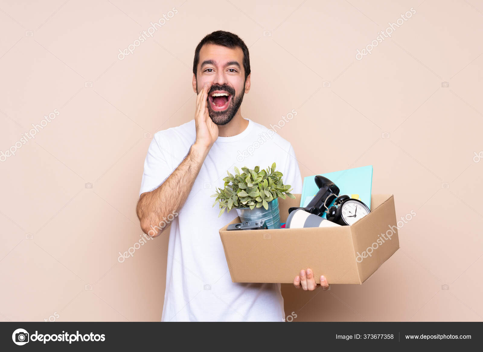 Man Holding Box Moving New Home Isolated Background Shouting Announcing ...