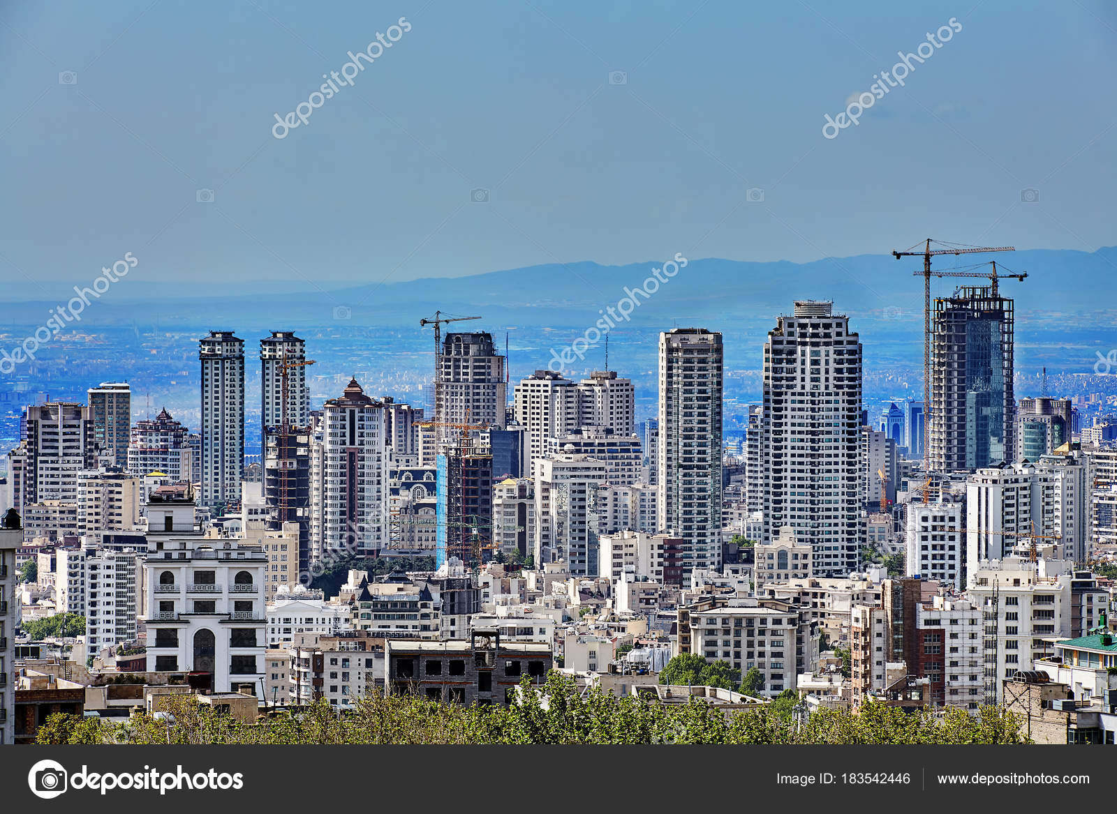 Images: tehran mountains | Skyscrapers on hillside and mountains in ...