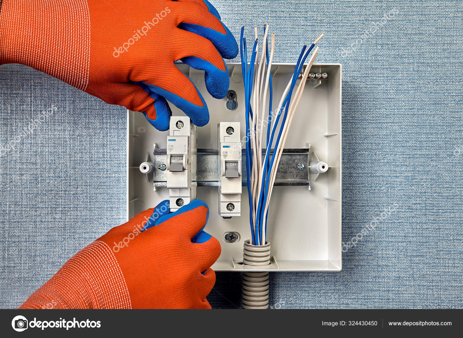 Installation of circuit breakers on a DIN rail. Stock Photo by ...