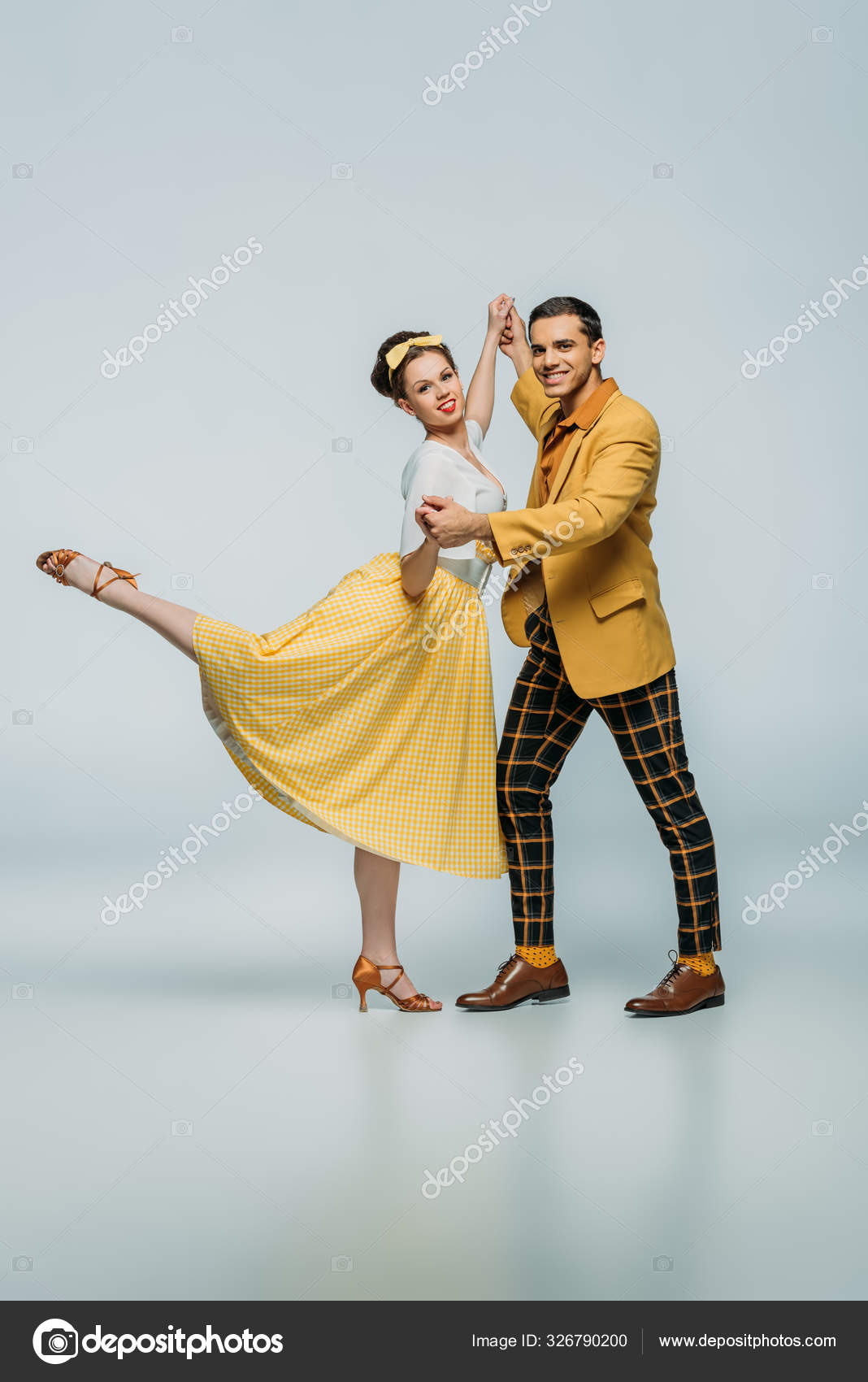Stylish Dancers Holding Hands While Dancing Boogie Woogie Grey ...