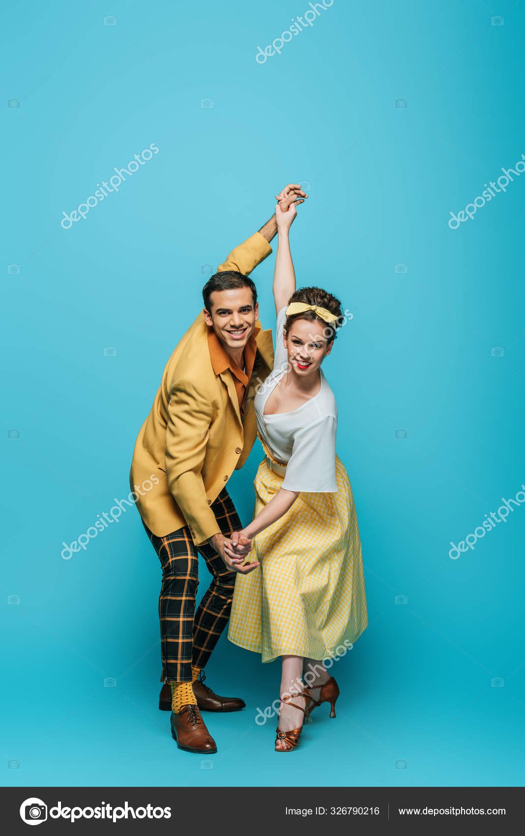 Stylish Dancers Holding Hands While Dancing Boogie Woogie Blue ...