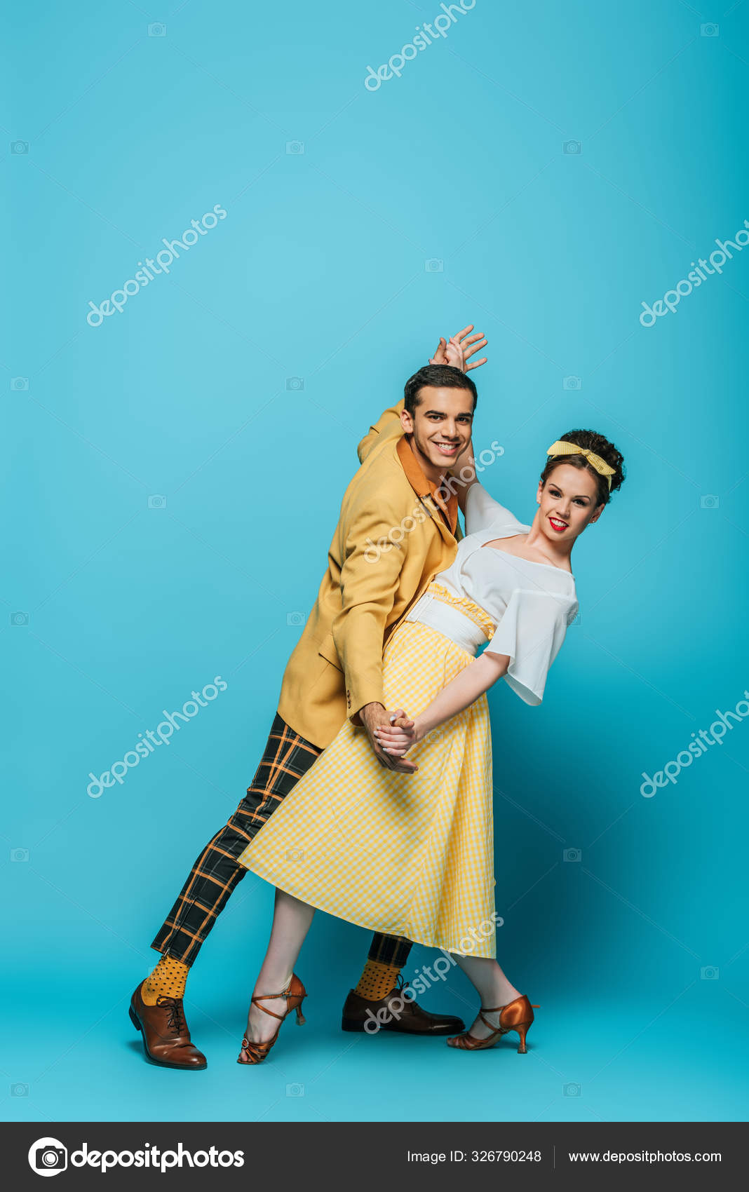 Stylish Dancers Holding Hands While Dancing Boogie Woogie Blue ...