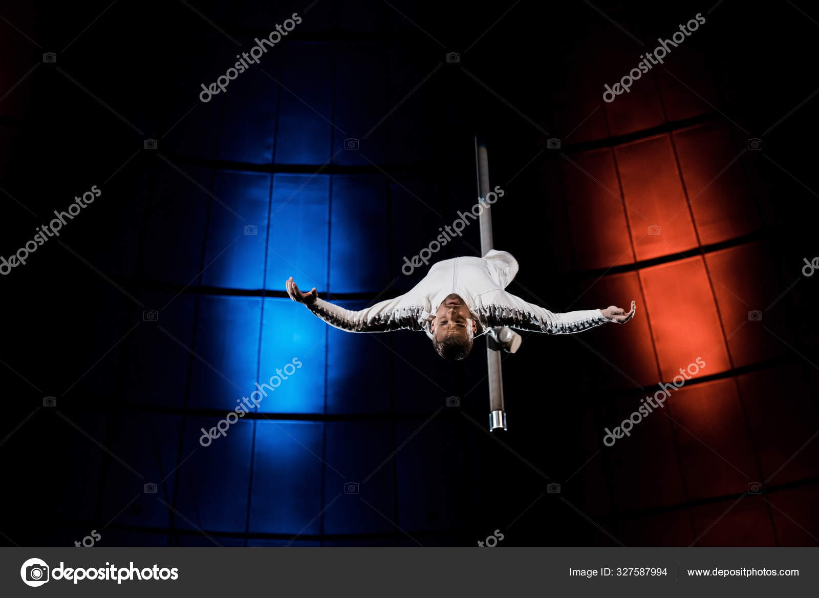 Strong Acrobat Outstretched Hands Performing Metallic Pole ⬇ Stock ...