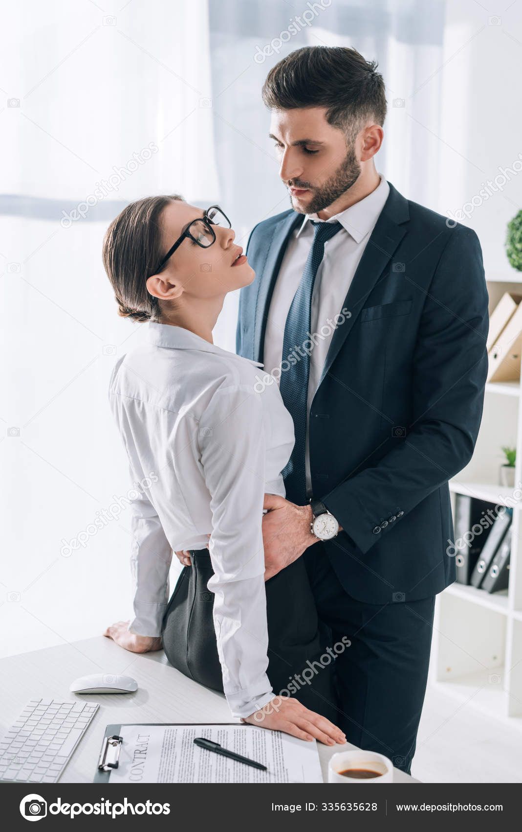 Handsome Businessman Hugging Attractive Secretary Closed Eyes Office