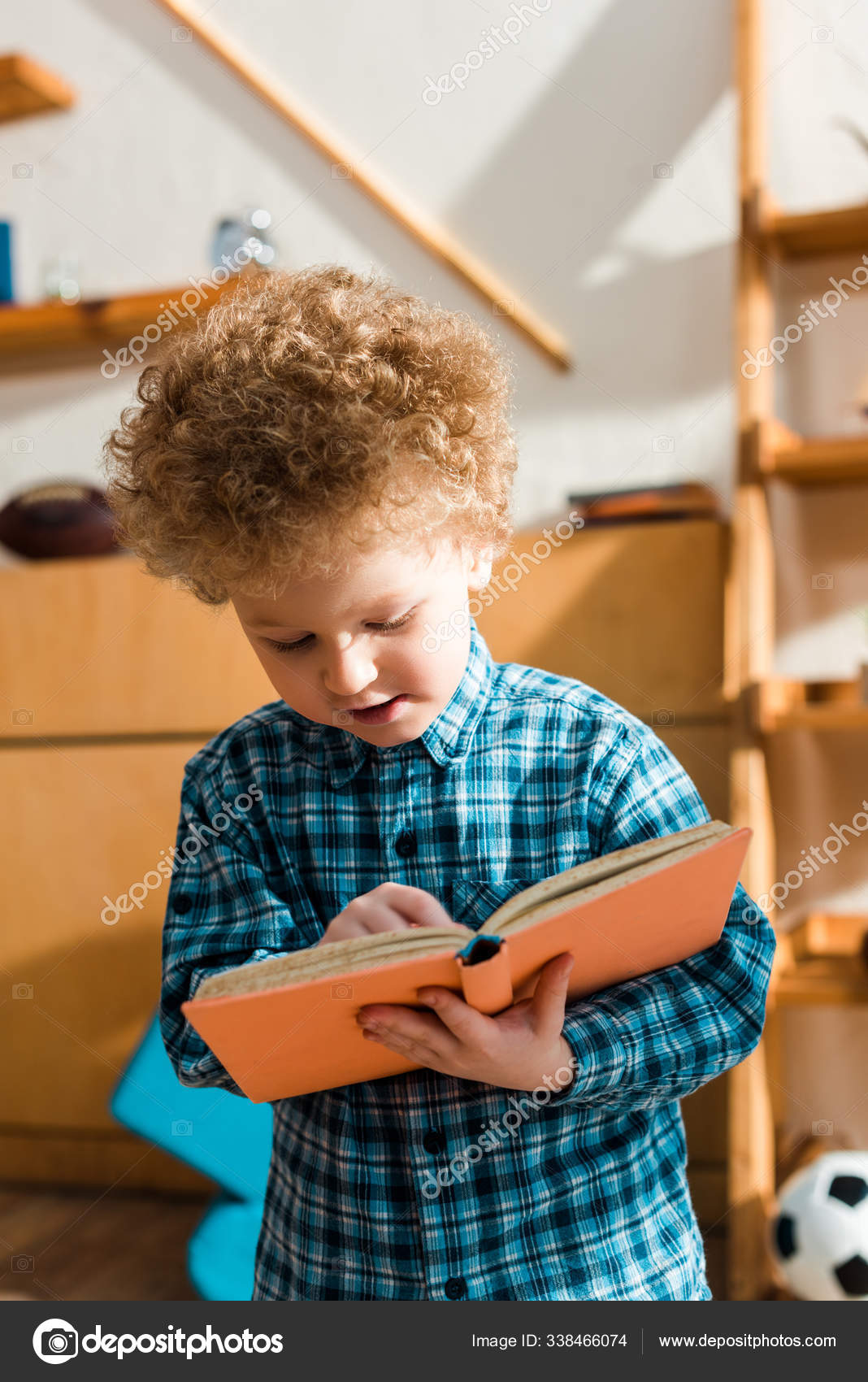Smart Child Smiling While Reading Book — Stock Photo © HayDmitriy ...