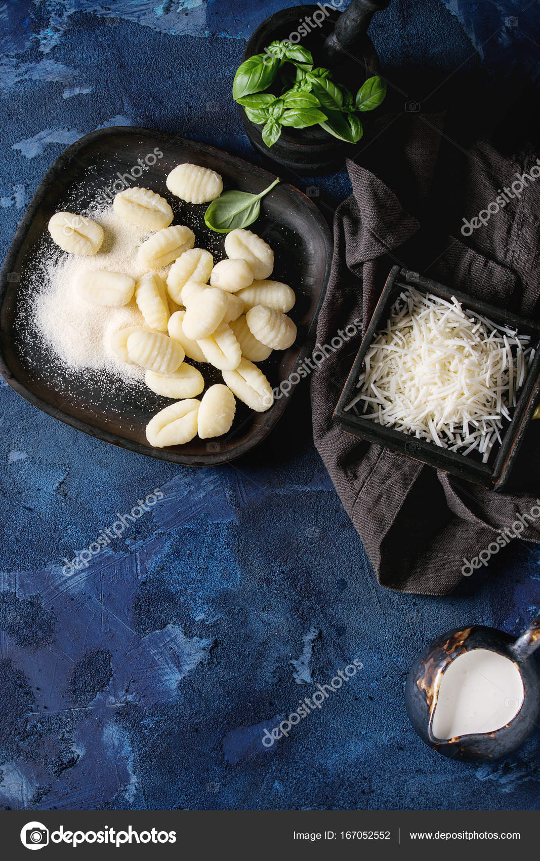 Raw uncooked potato gnocchi Stock Photo by ©NatashaBreen 167052552