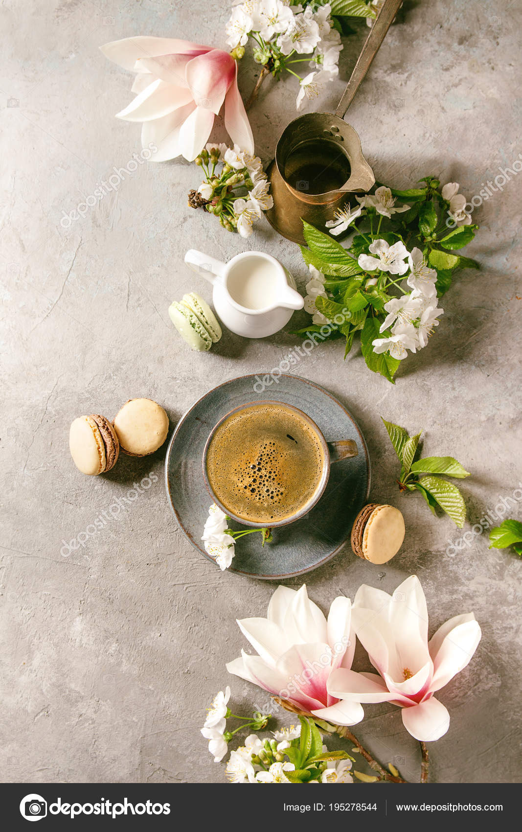 Coffee with spring flowers Stock Photo by ©NatashaBreen 195278544