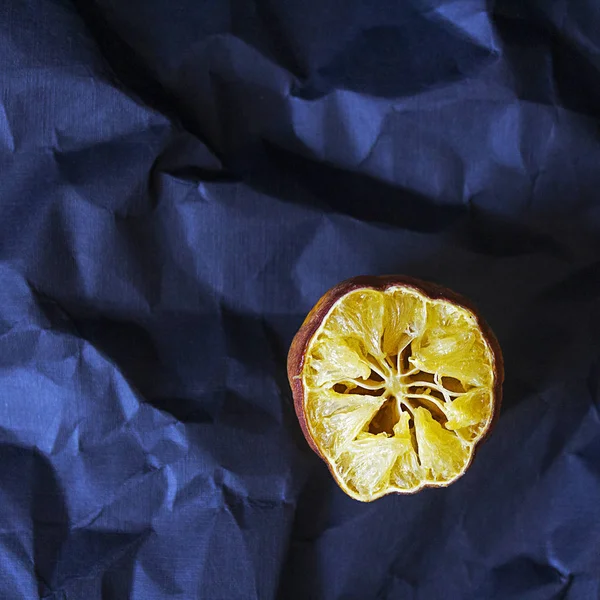 Ugly organic lemon. Deformed half of a lemon with old flesh with ...