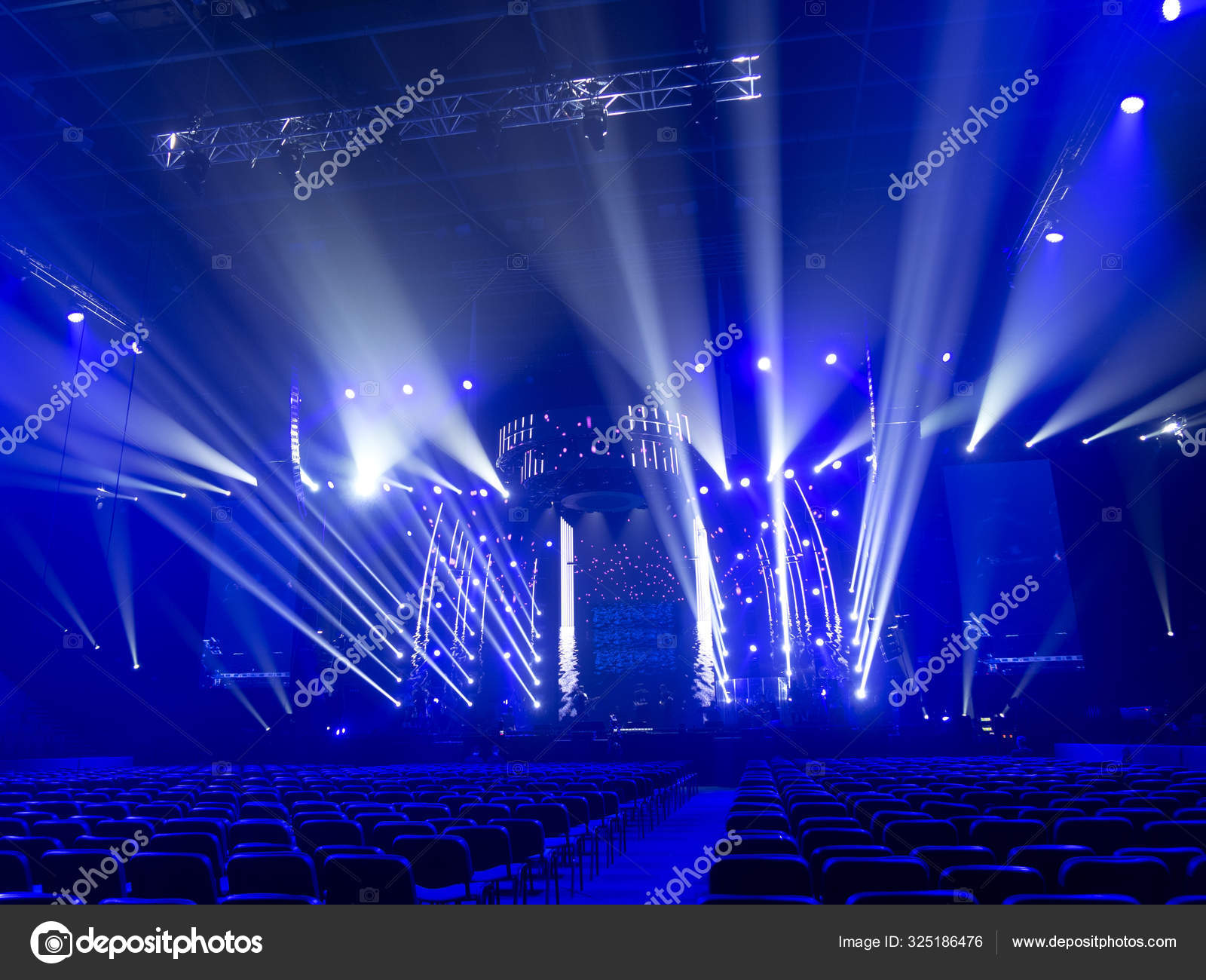 Bright beautiful rays of light on an stage before the concert. — Stock ...