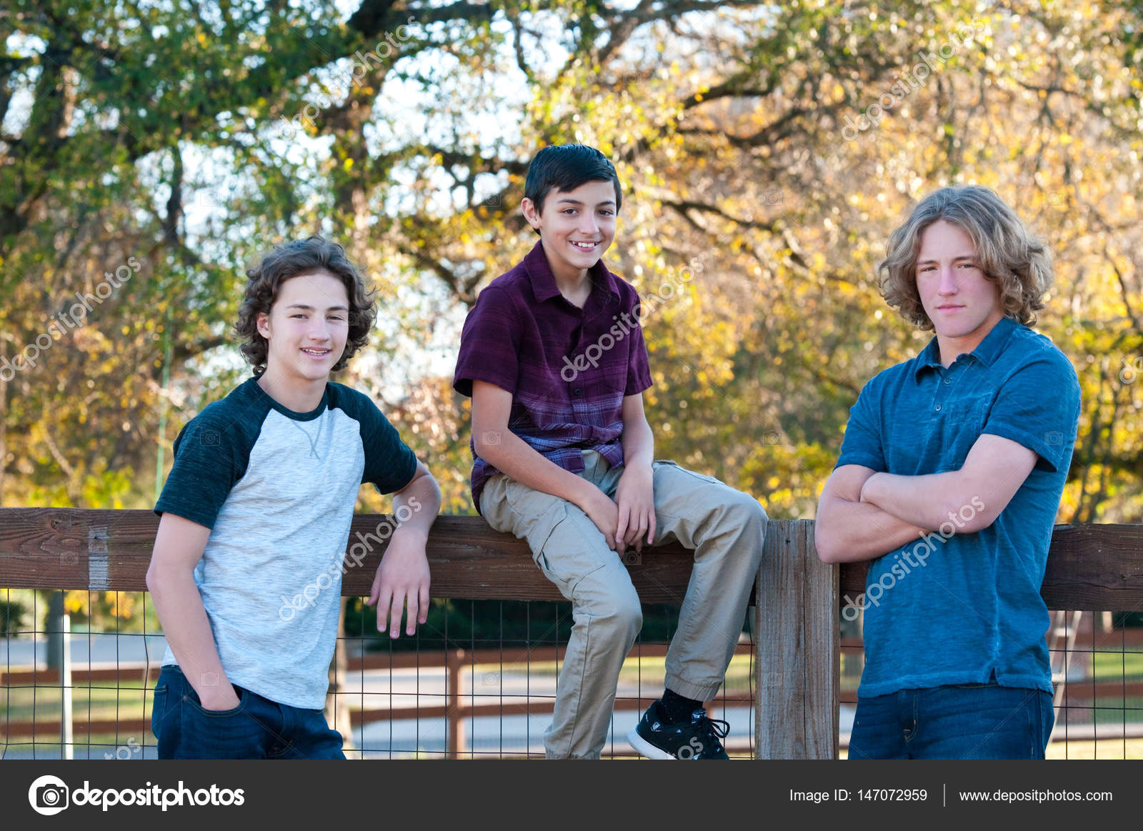 Three handsome boys posing outdoors Stock Photo by ©tammykayphoto 147072959