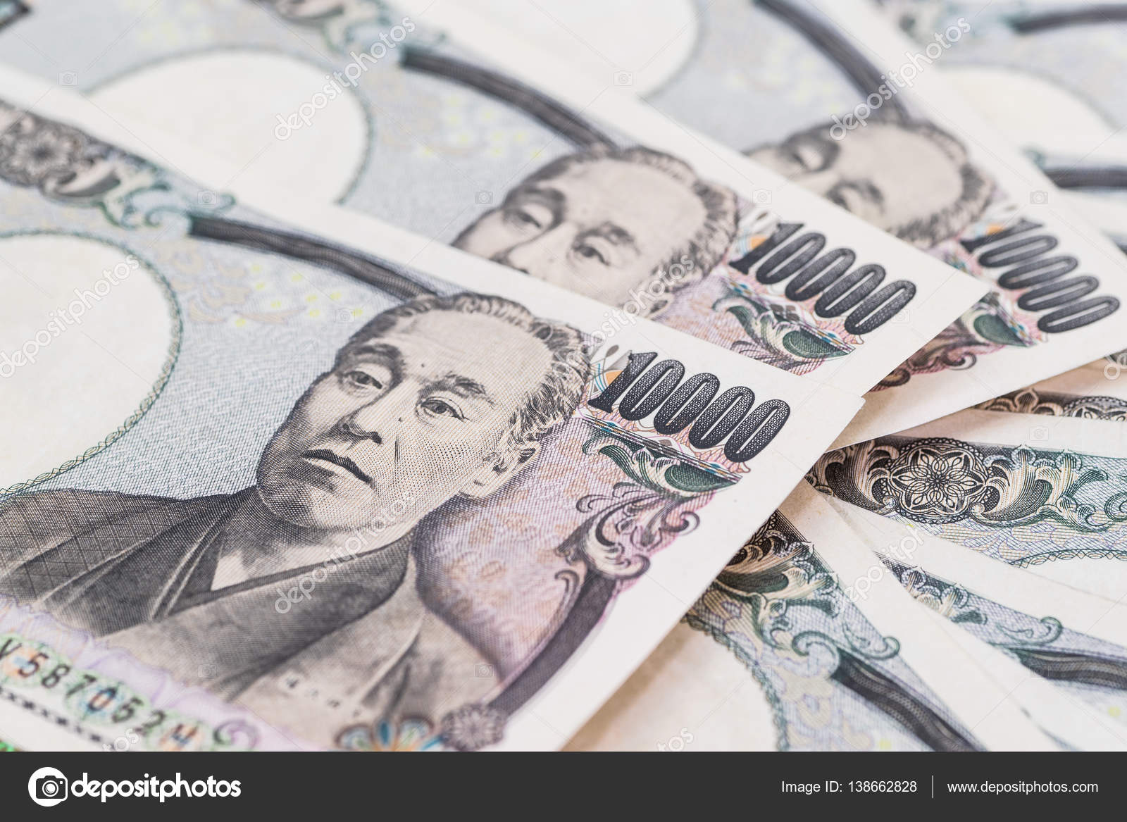 Stack of Japanese yen Stock Photo by ©Torsakarin 138662828
