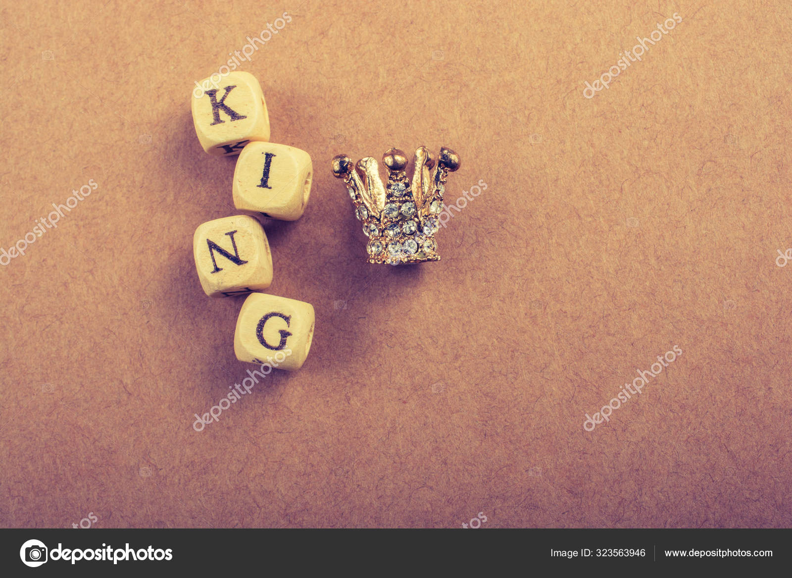 Tiny Model Crown King Wording Brown Stock Photo by ©YAYImages 323563946