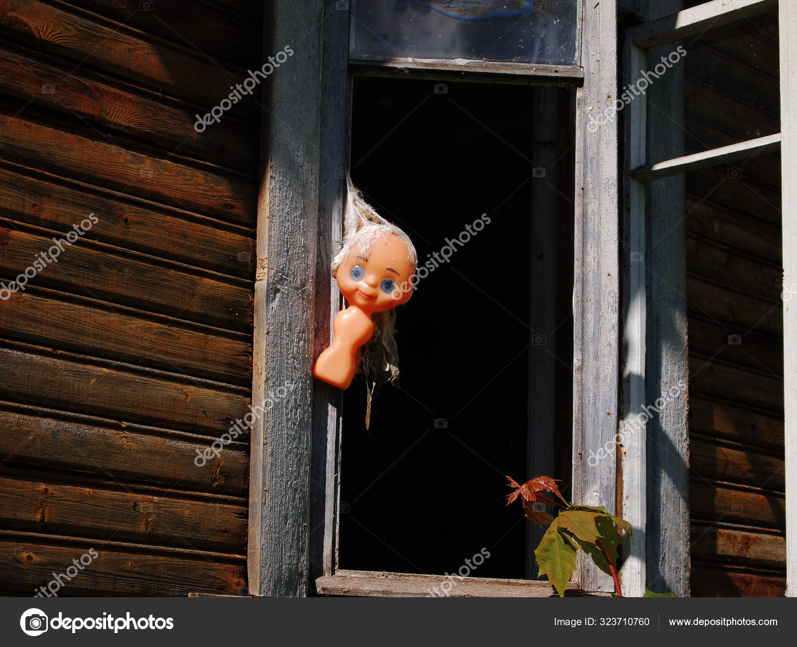Disfigured Doll Window Abandoned House Stock Photo by ©YAYImages 323710760
