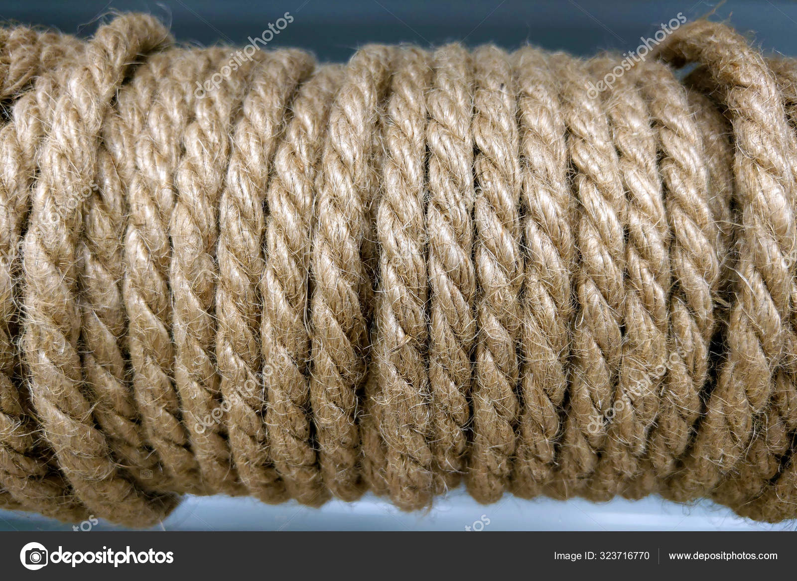 Coiled Rope Close Background Texture Stock Photo by ©YAYImages 323716770