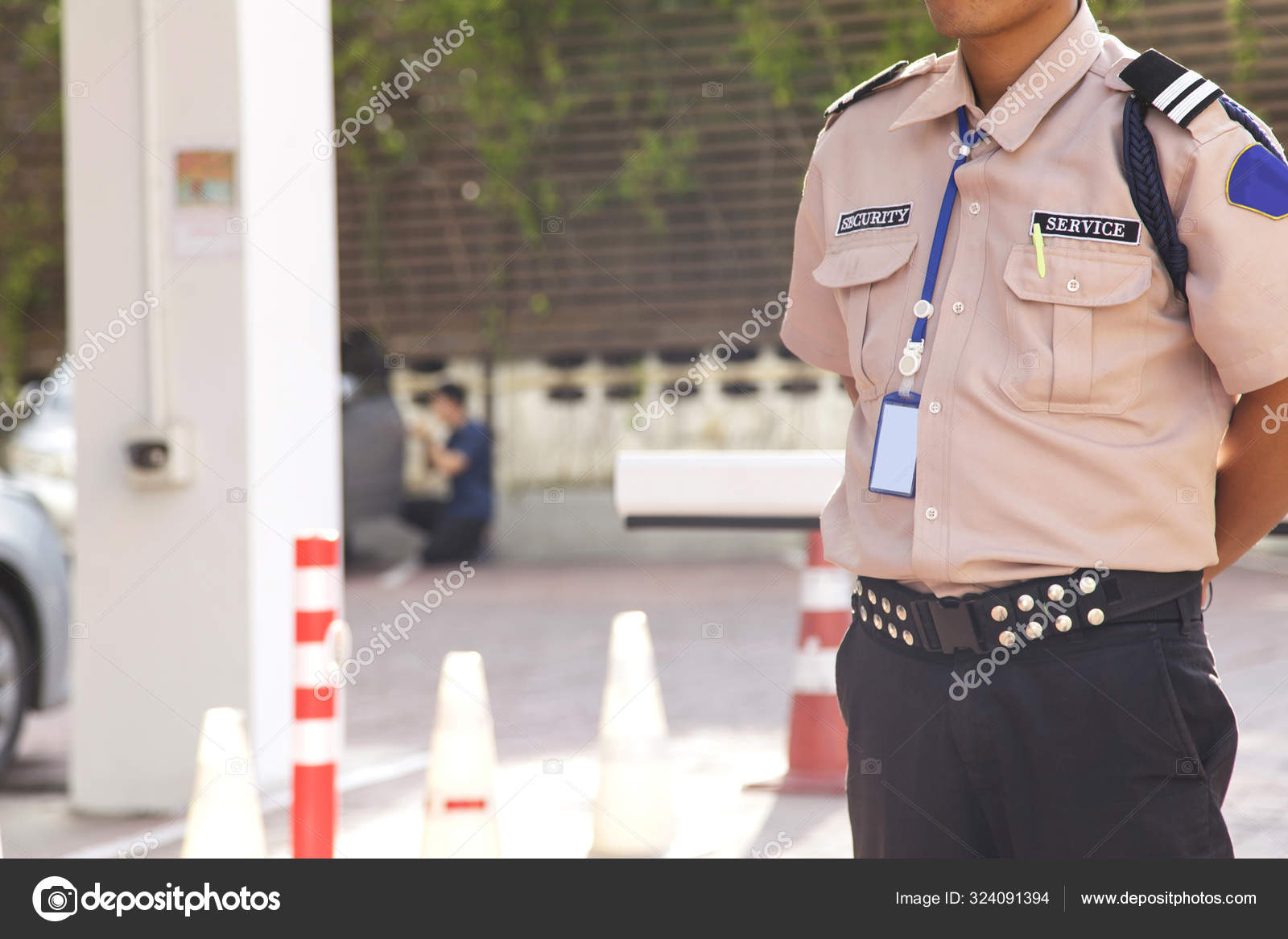 Security Guard Opening Barrier Gate Stock Photo by ©YAYImages 324091394