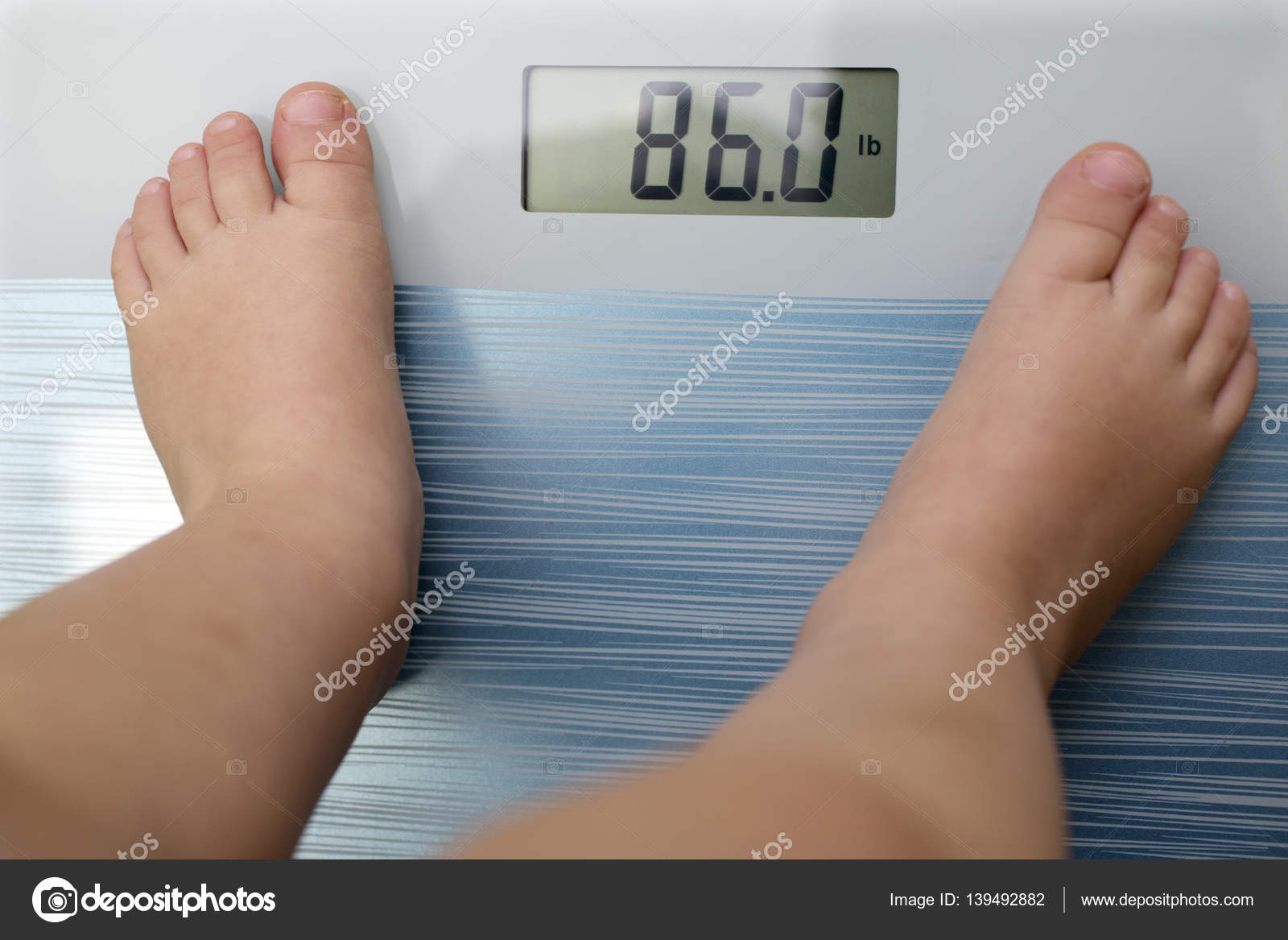 Children overweight, scale Stock Photo by ©Taborsky 139492882