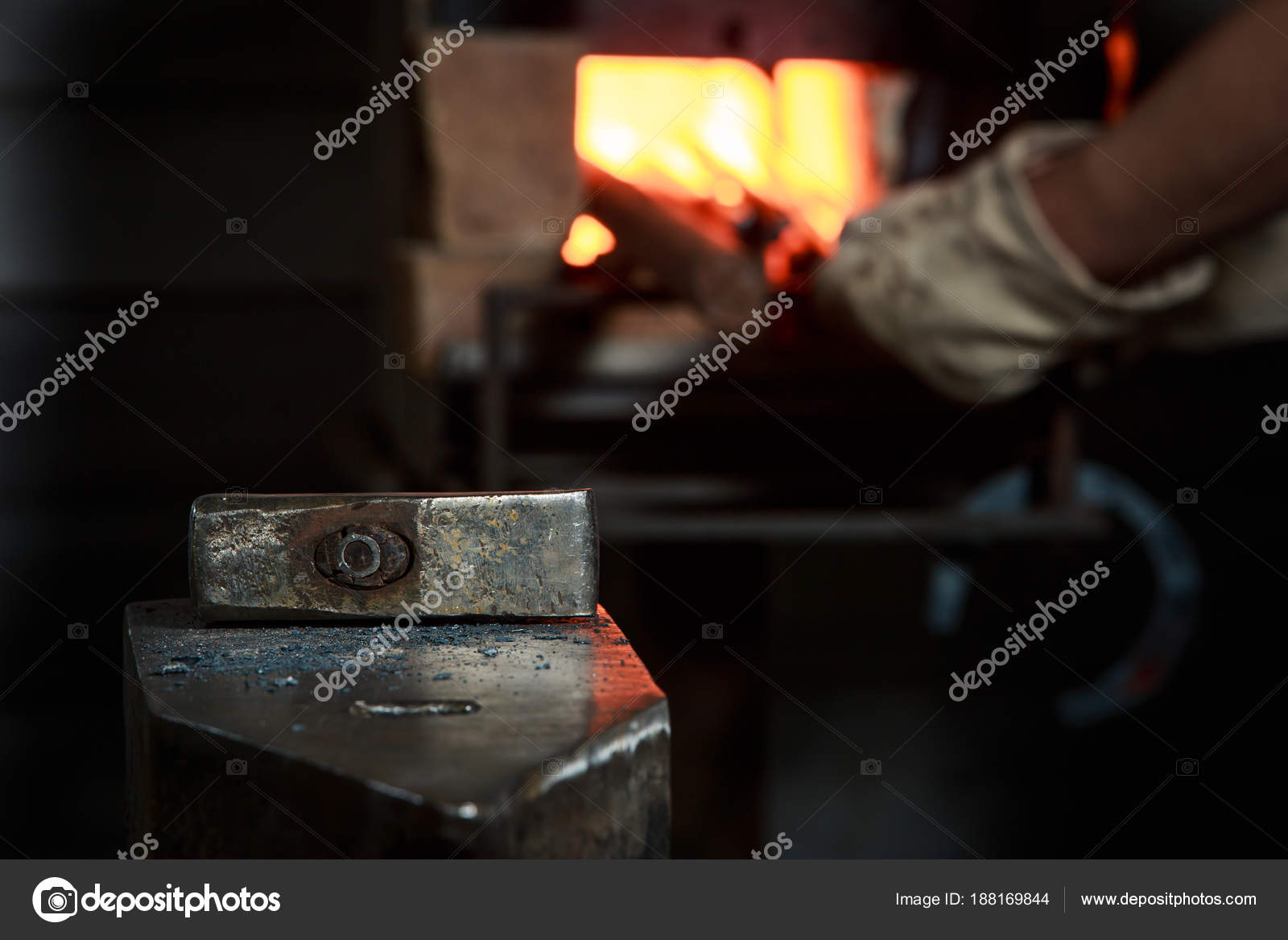 Creating iron tools in blacksmith's on the old plank wood table — Stock ...